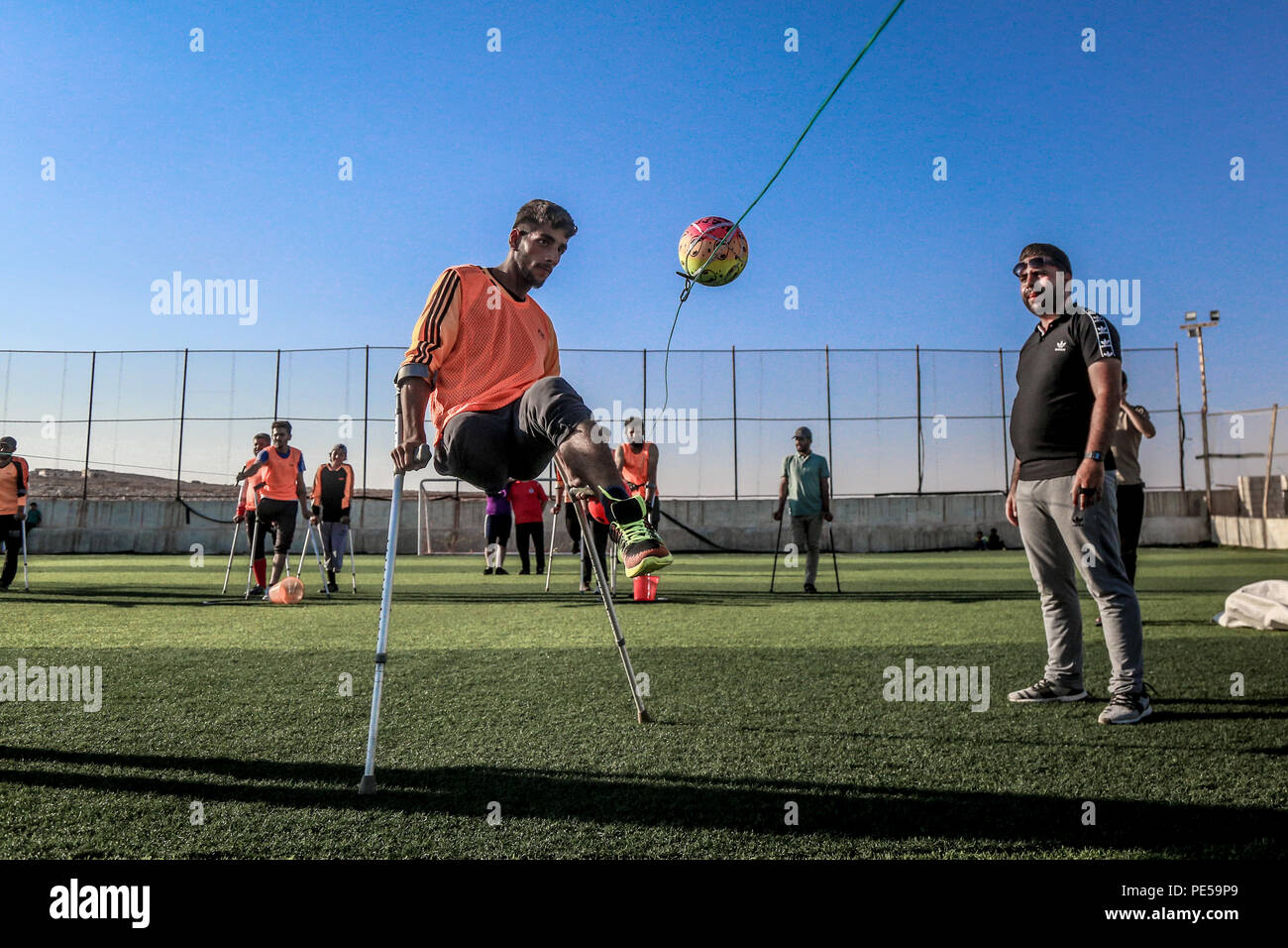 People Playing Football In Action