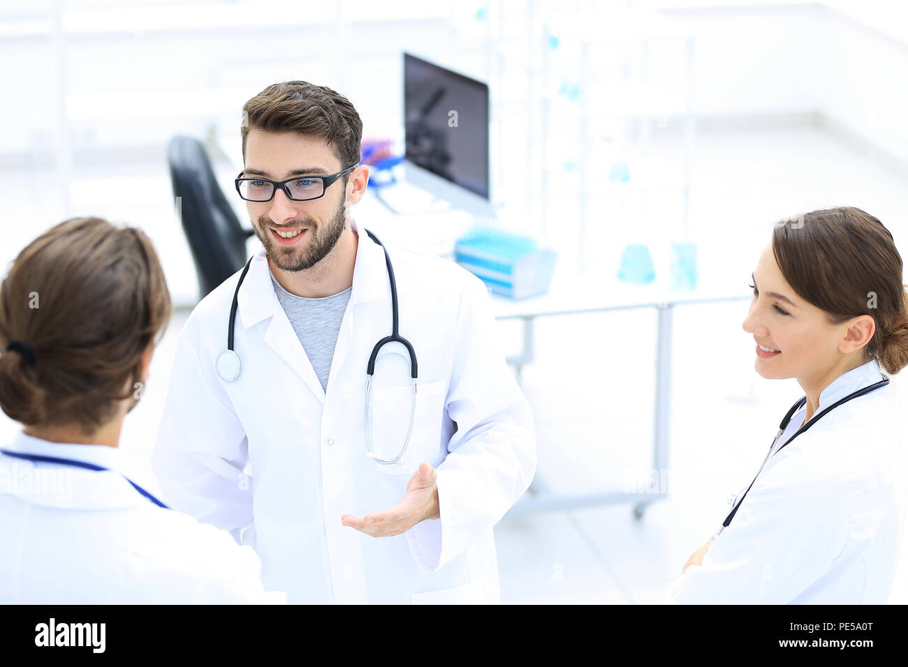 Group of doctors talking Stock Photo - Alamy
