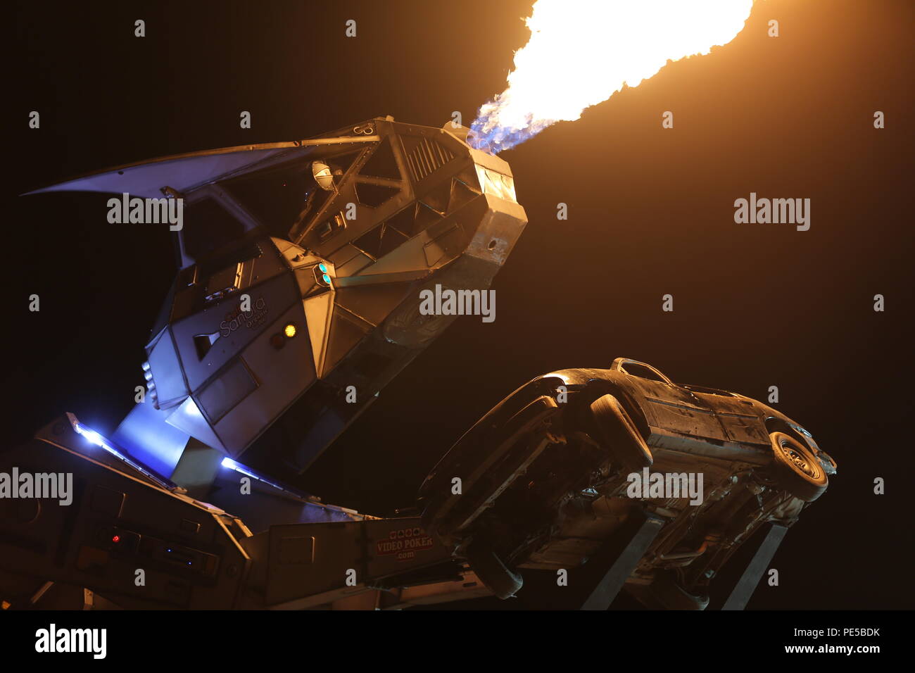 Robosaurus crushes a car during its performance at the 2015 MCAS ...
