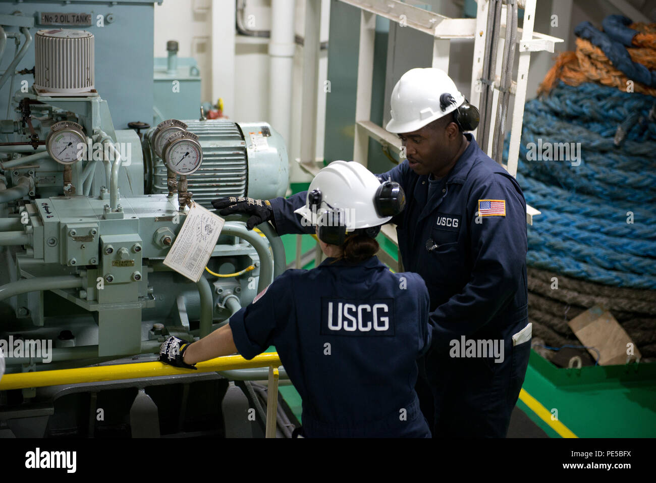 Petty Officer 1st Class Edgar Douglas, a marine science technician ...