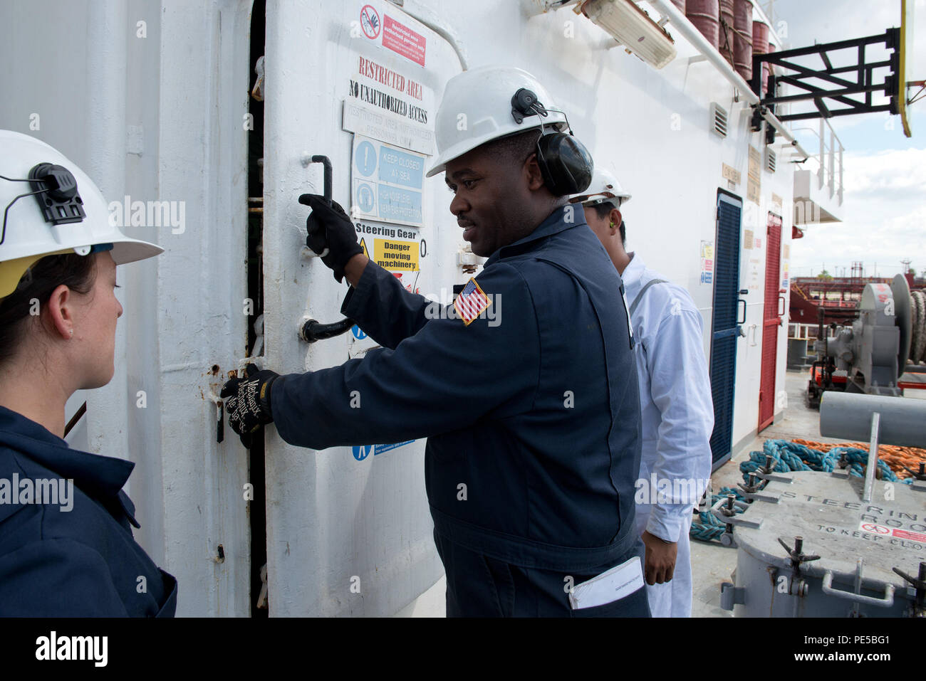 Petty Officer 1st Class Edgar Douglas, a marine science technician ...
