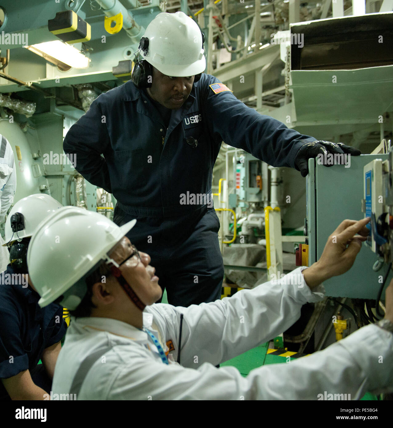 Petty Officer 1st Class Edgar Douglas, a marine science technician, and ...