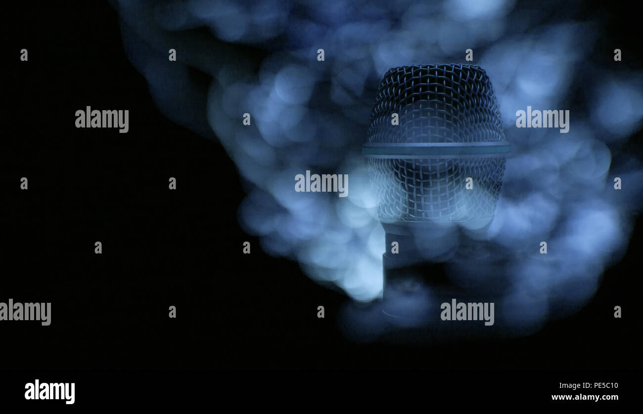 Microphone on dark background. Karaoke party, mic on stage Stock Photo ...