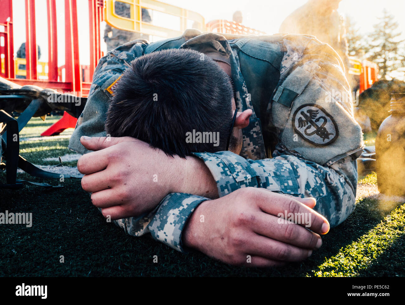 A U.S. Army soldier Expert Field Medic Badge candidate, falls to the ...