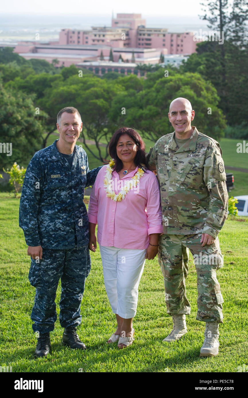 Anita Clingerman, center, Tripler Fisher House manager, poses with U.S ...