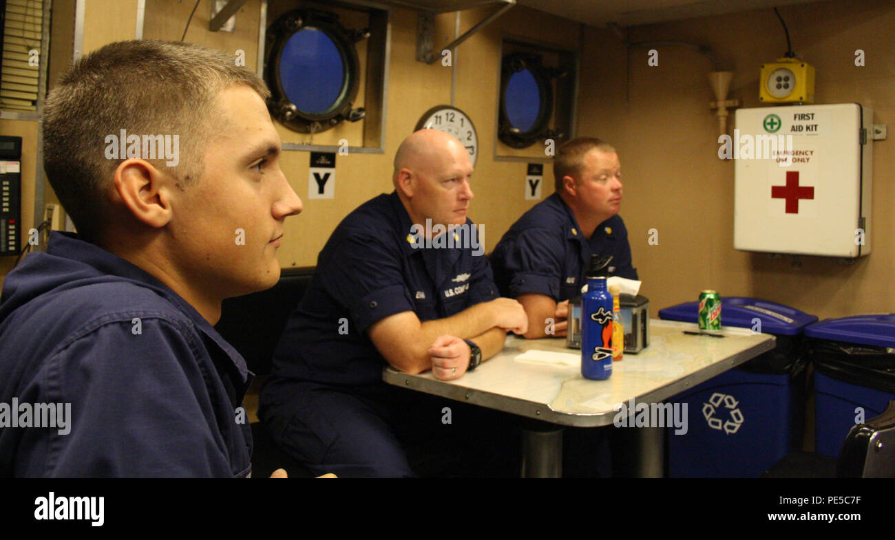 Seaman Nicholas Kalis and Petty Officers 1st Class Timothy Evans and ...