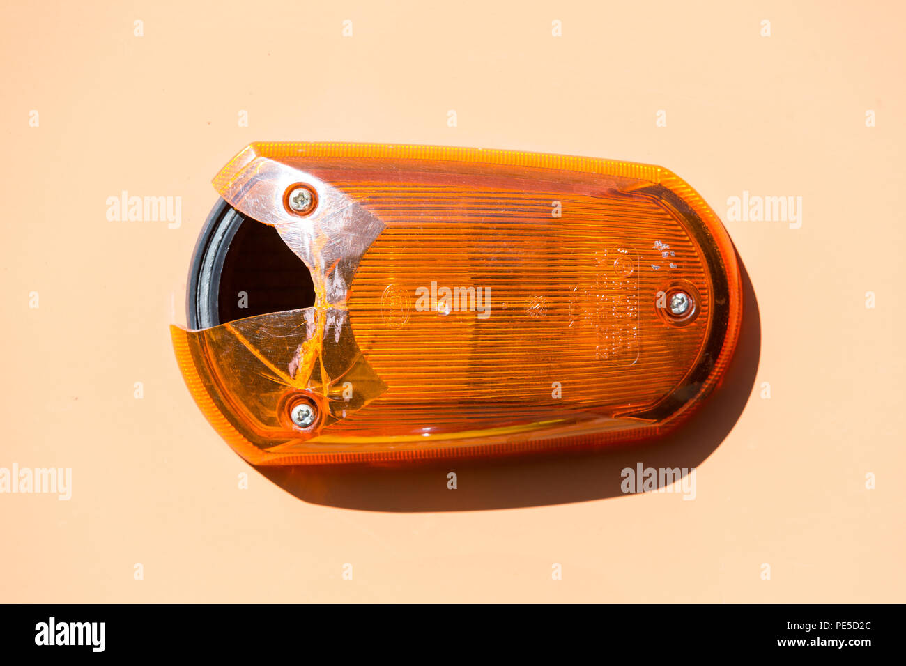 Broken orange side indicator light Stock Photo - Alamy