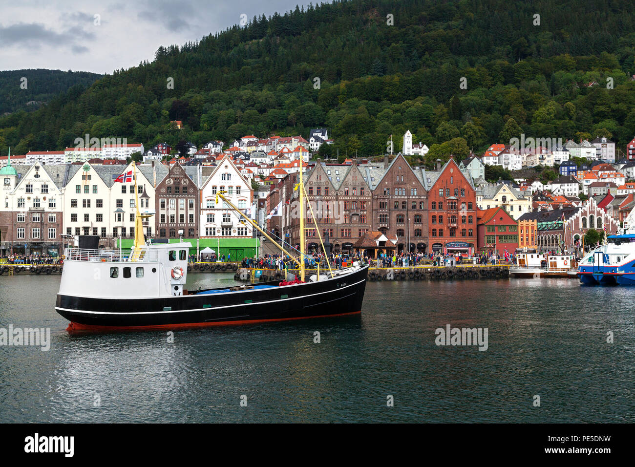 Veteran freighter Axel arriving in the port of Bergen, Norway ...