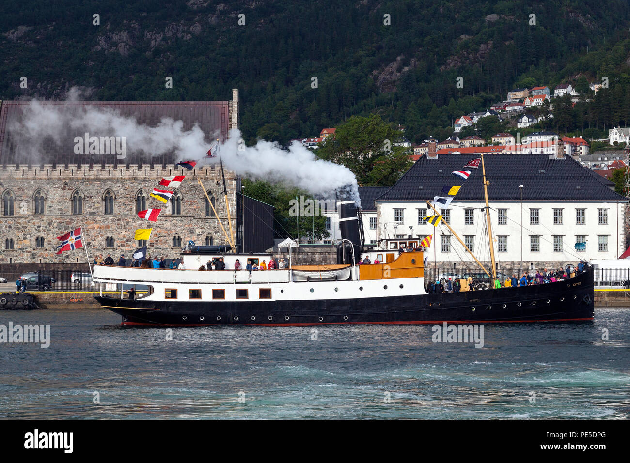 Veteran steamship Oster (1908) arriving in the port of Bergen, Norway ...
