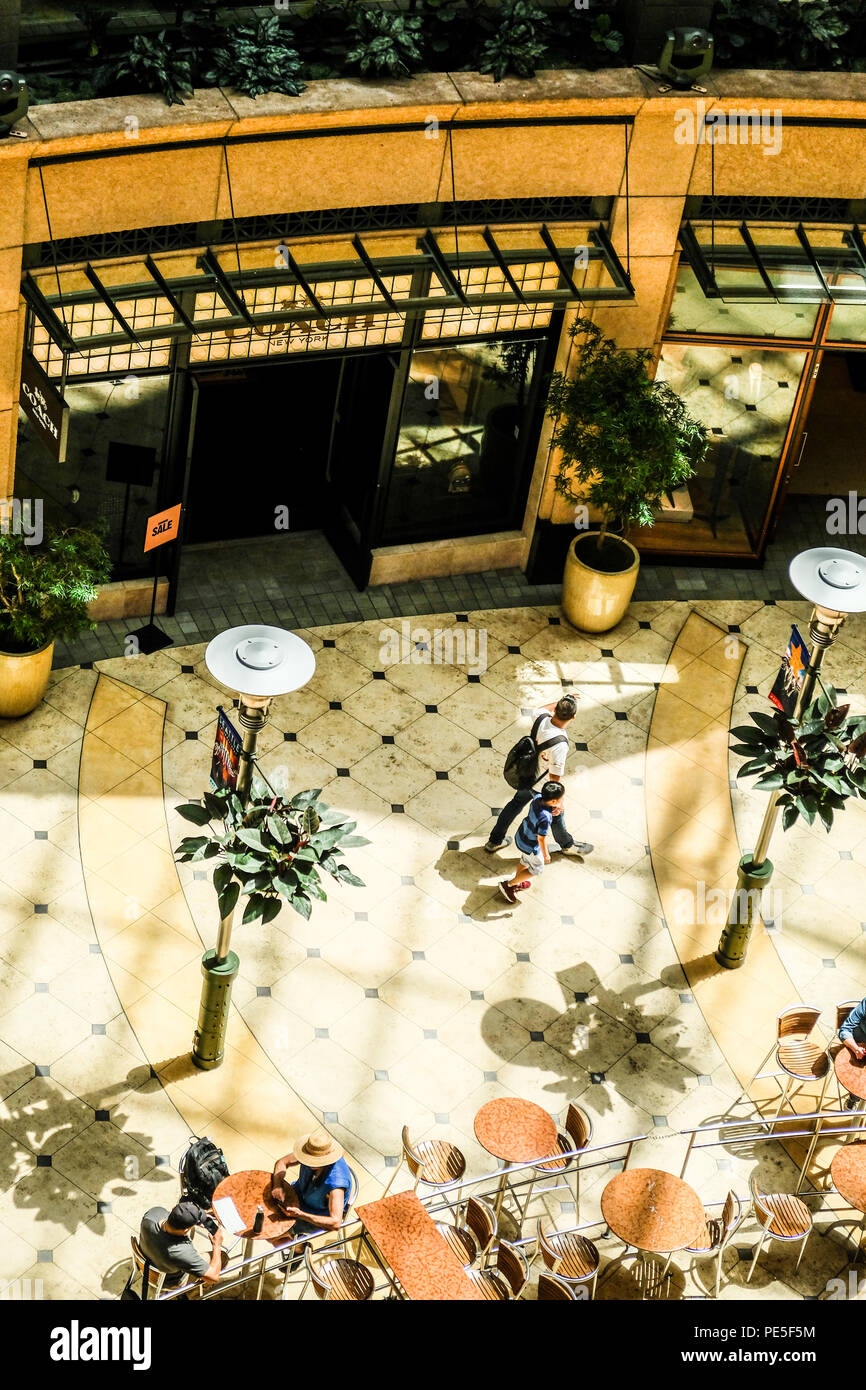 Bird's eye view inside a shopping mall Stock Photo - Alamy
