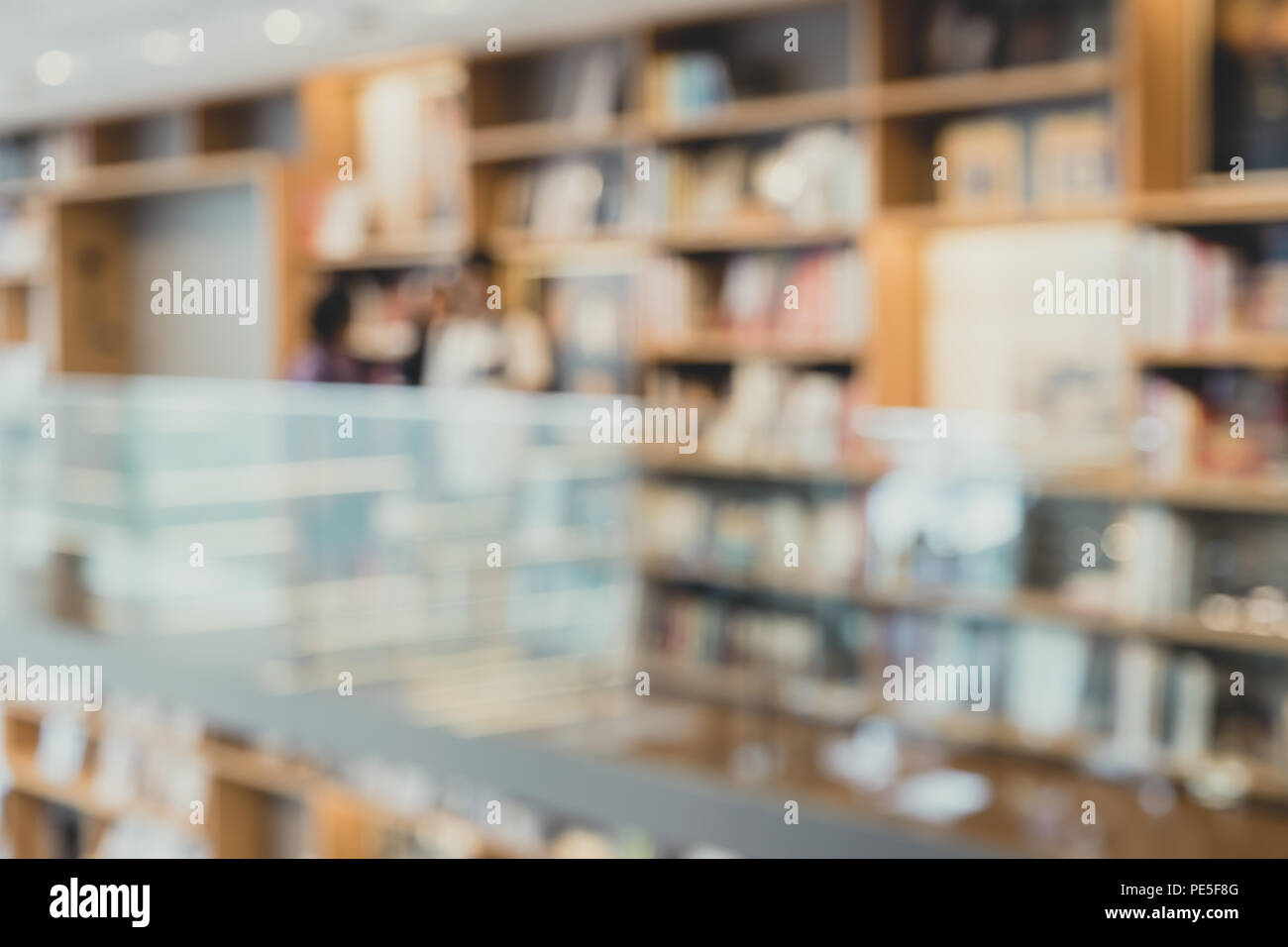 hallway of library with bookshelf library in university blur abstract ...