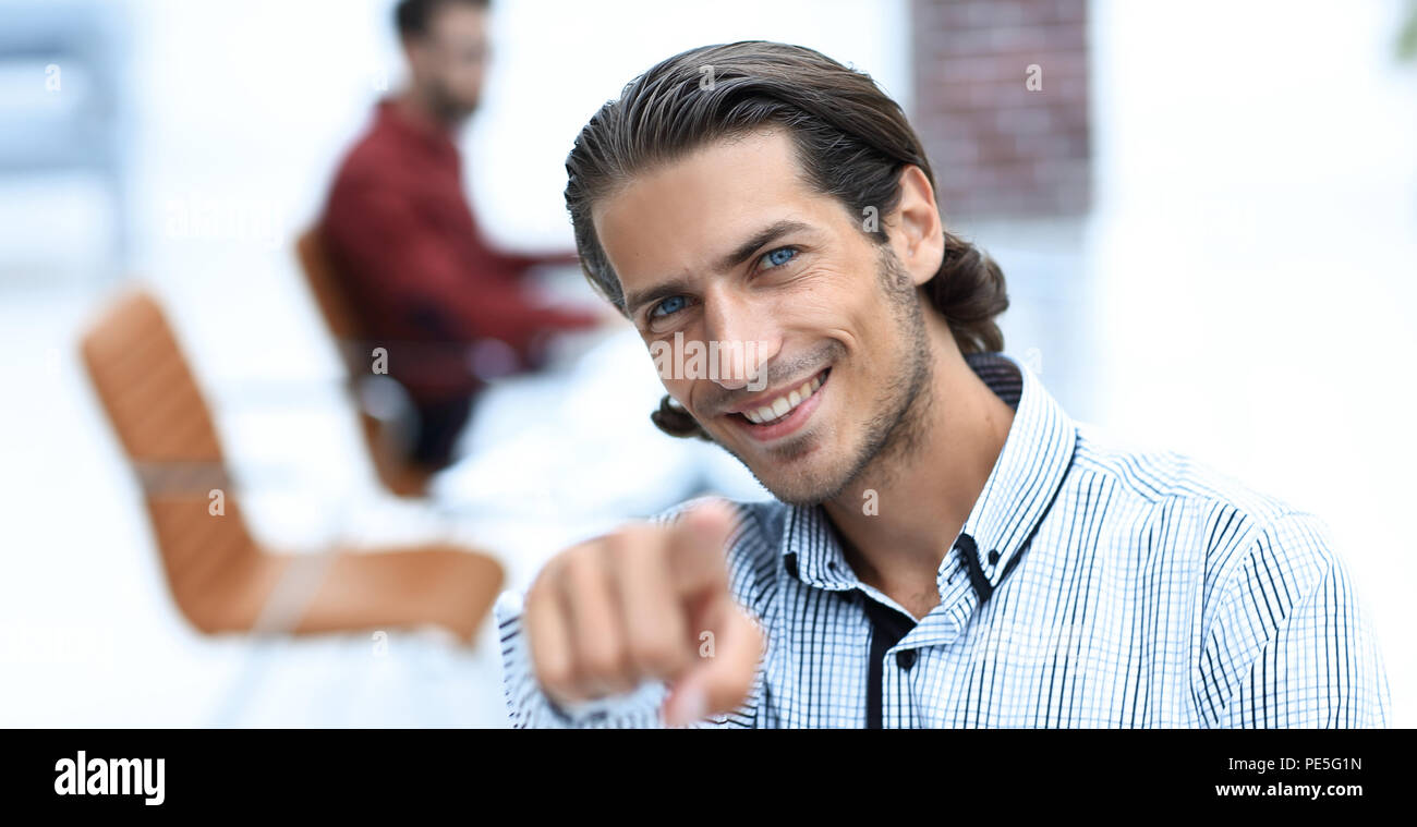 successful employee pointing forward Stock Photo - Alamy