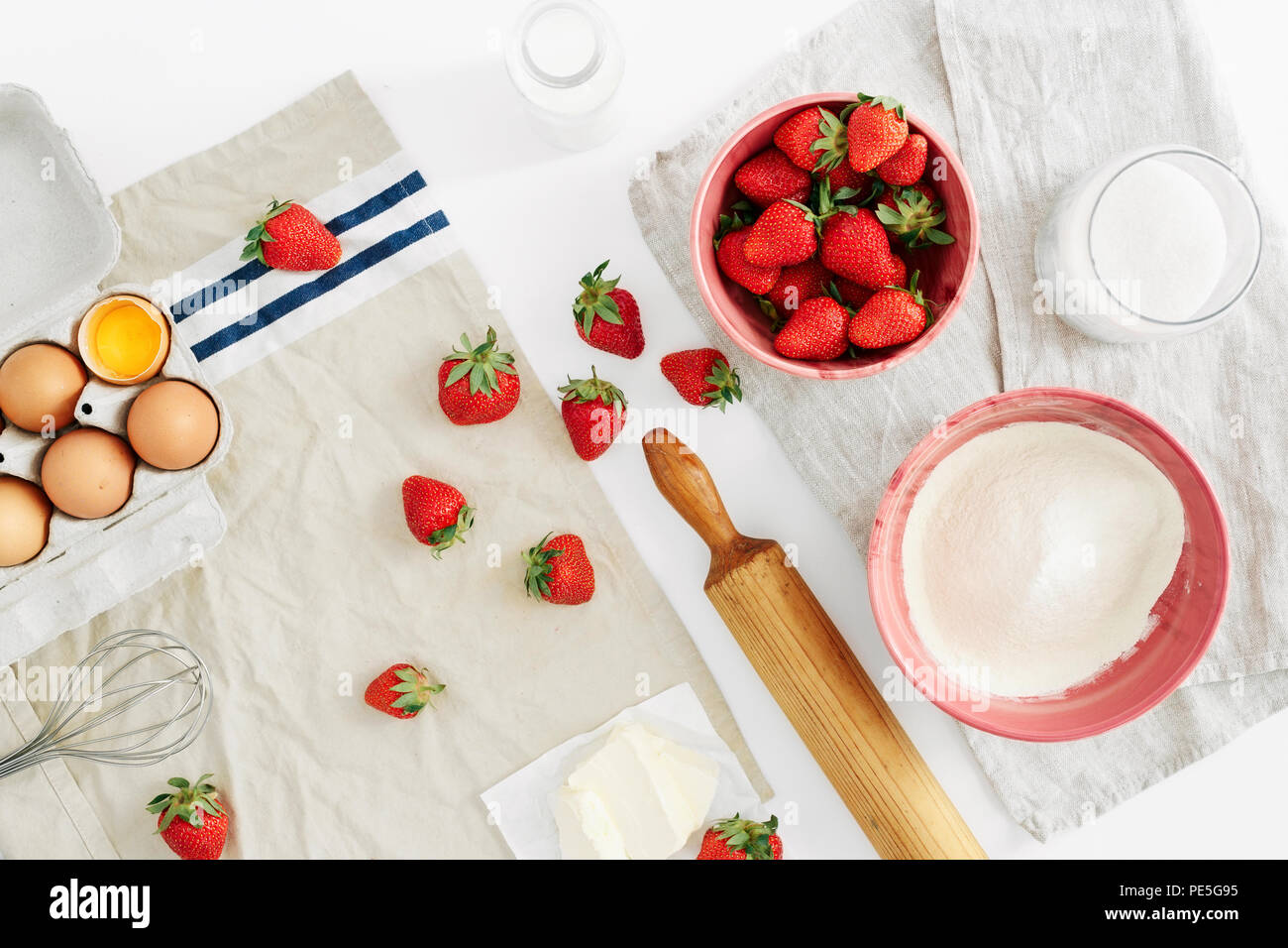 Flat lay set raw ingredients for cooking strawberry pie or cake on ...