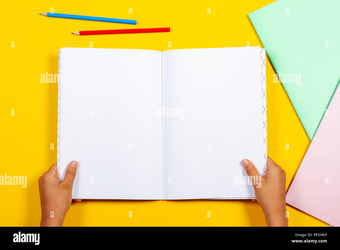 Child open book above desk hi-res stock photography and images - Alamy