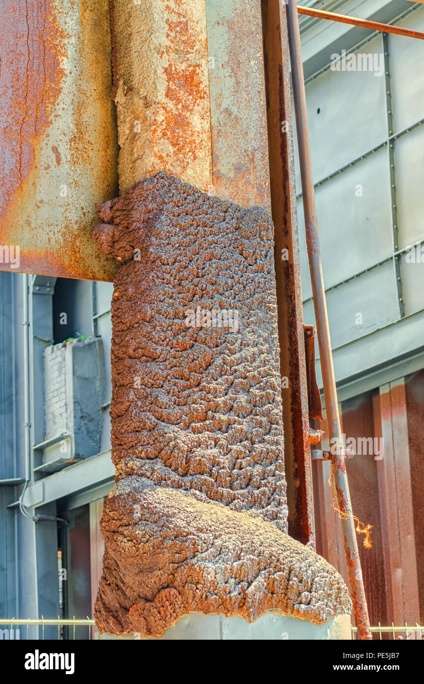 Molten iron, metal solidifies on a iron pillar Stock Photo - Alamy