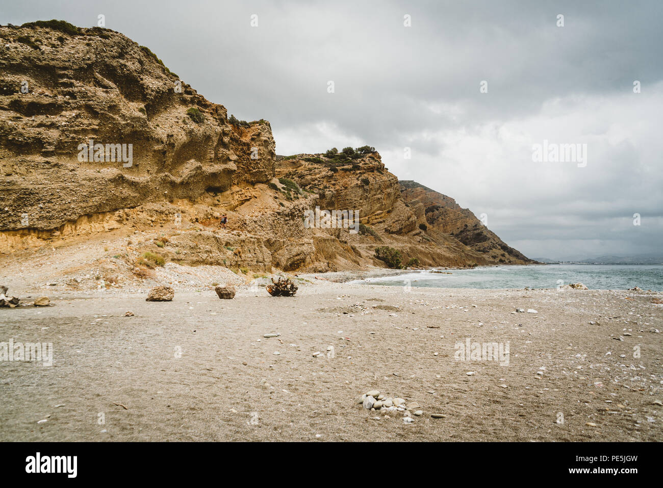 Typical beach scene in island crete. View towards ocean. With Mountains ...