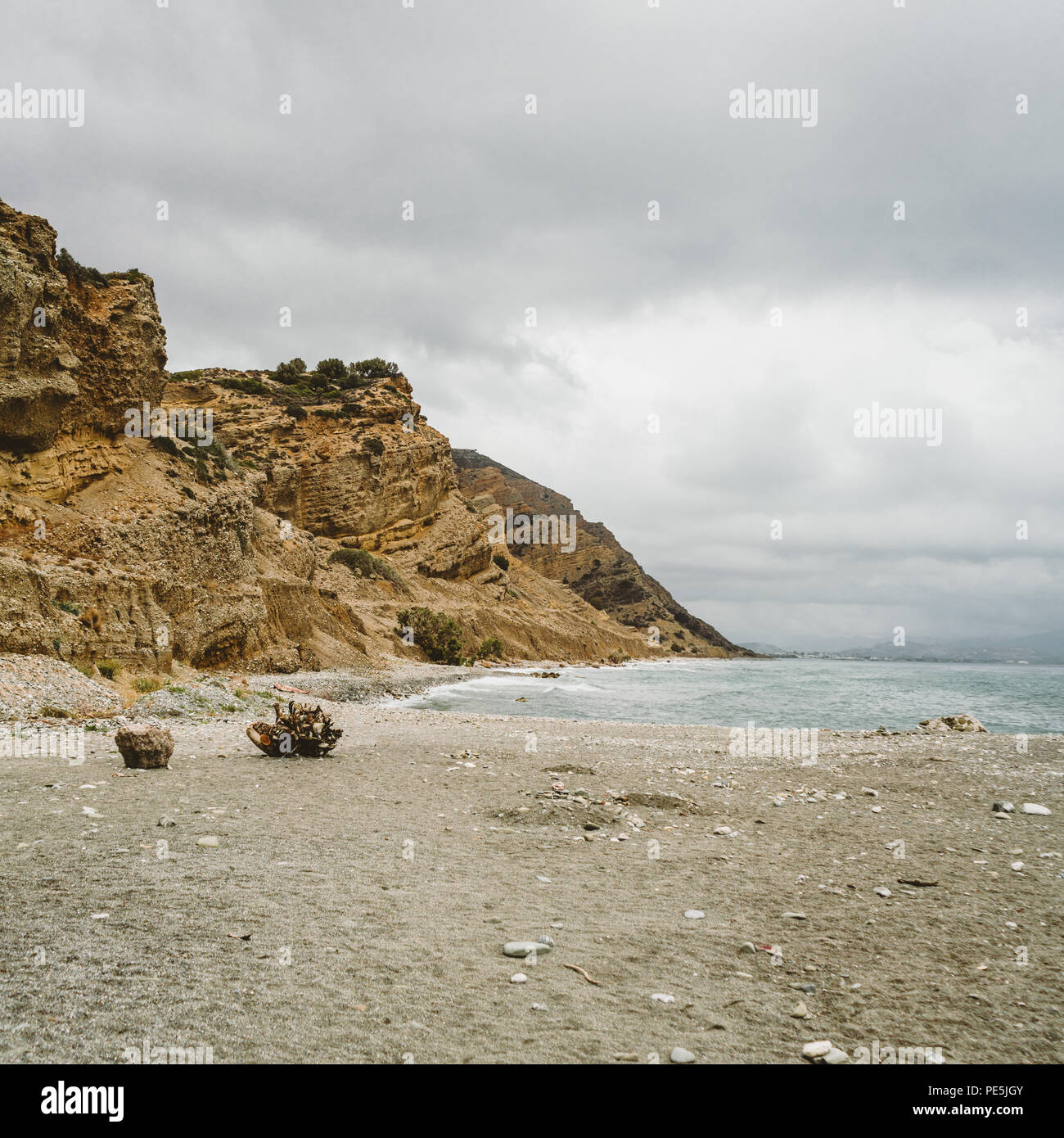 Typical beach scene in island crete. View towards ocean. With Mountains ...