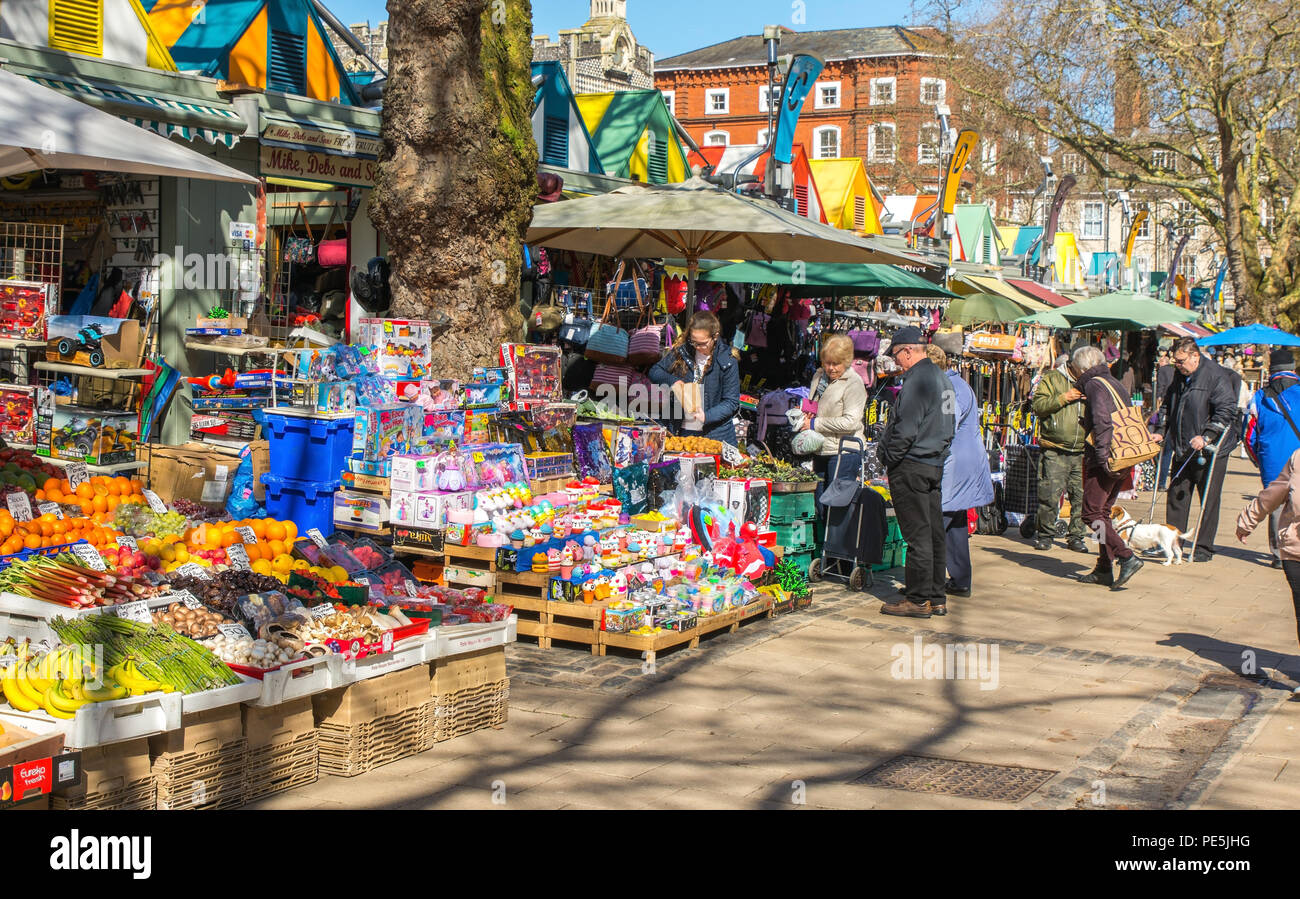 Colourful stalls of fruit and vegetables and other goods at the open ...