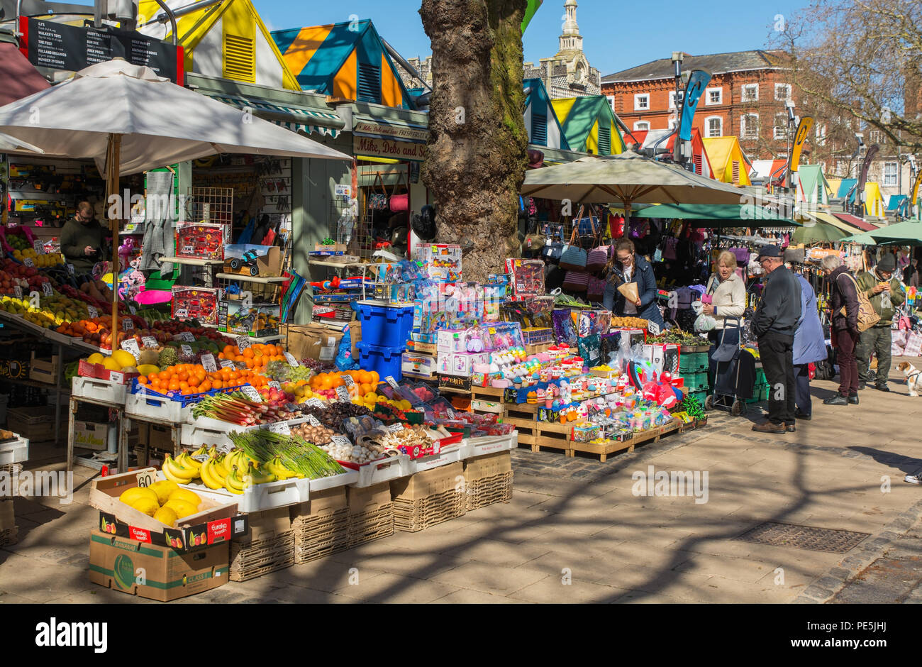 Colourful stalls of fruit and vegetables and other goods at the open ...