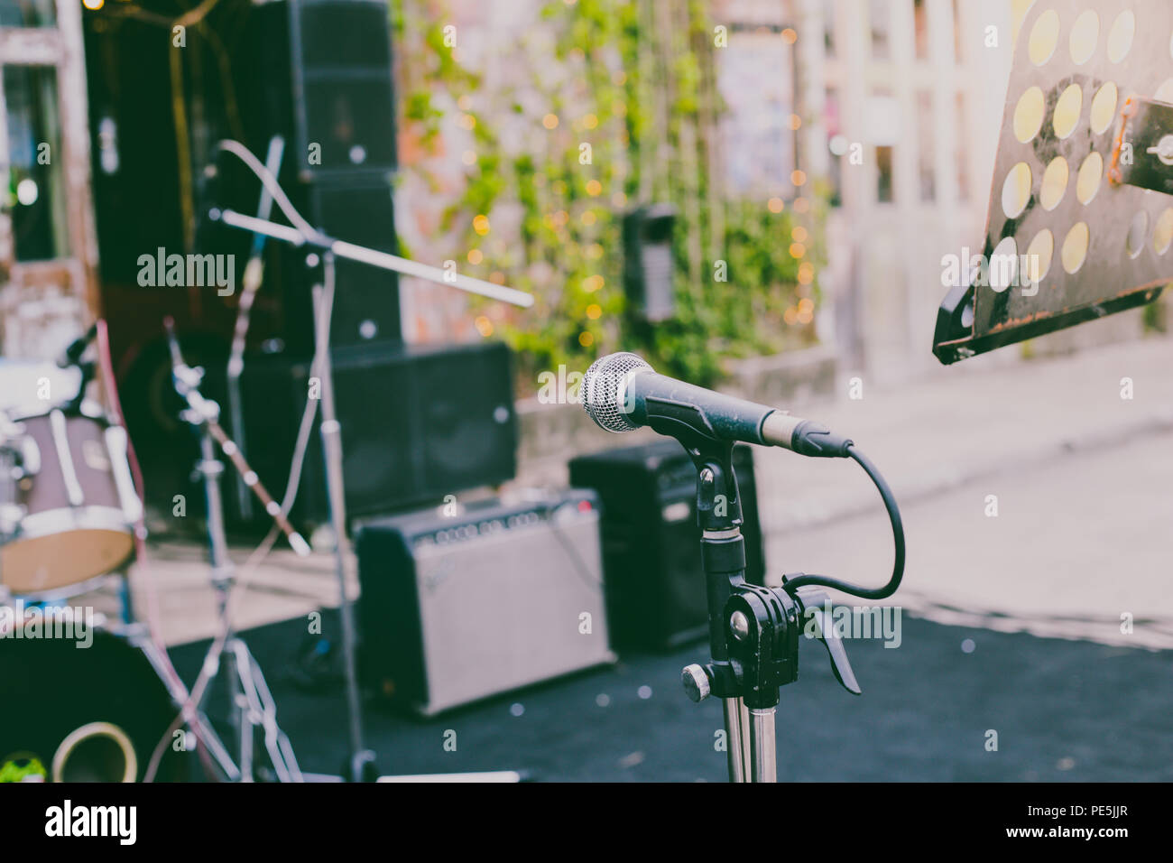 Microphone and music instrument on stage . vintage color tone Stock ...