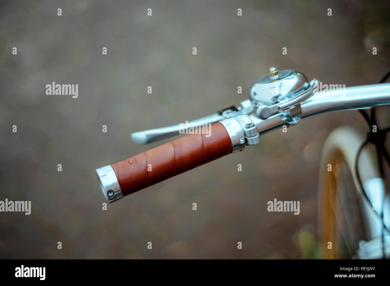 Bicycle handlebar covered in leather Stock Photo - Alamy