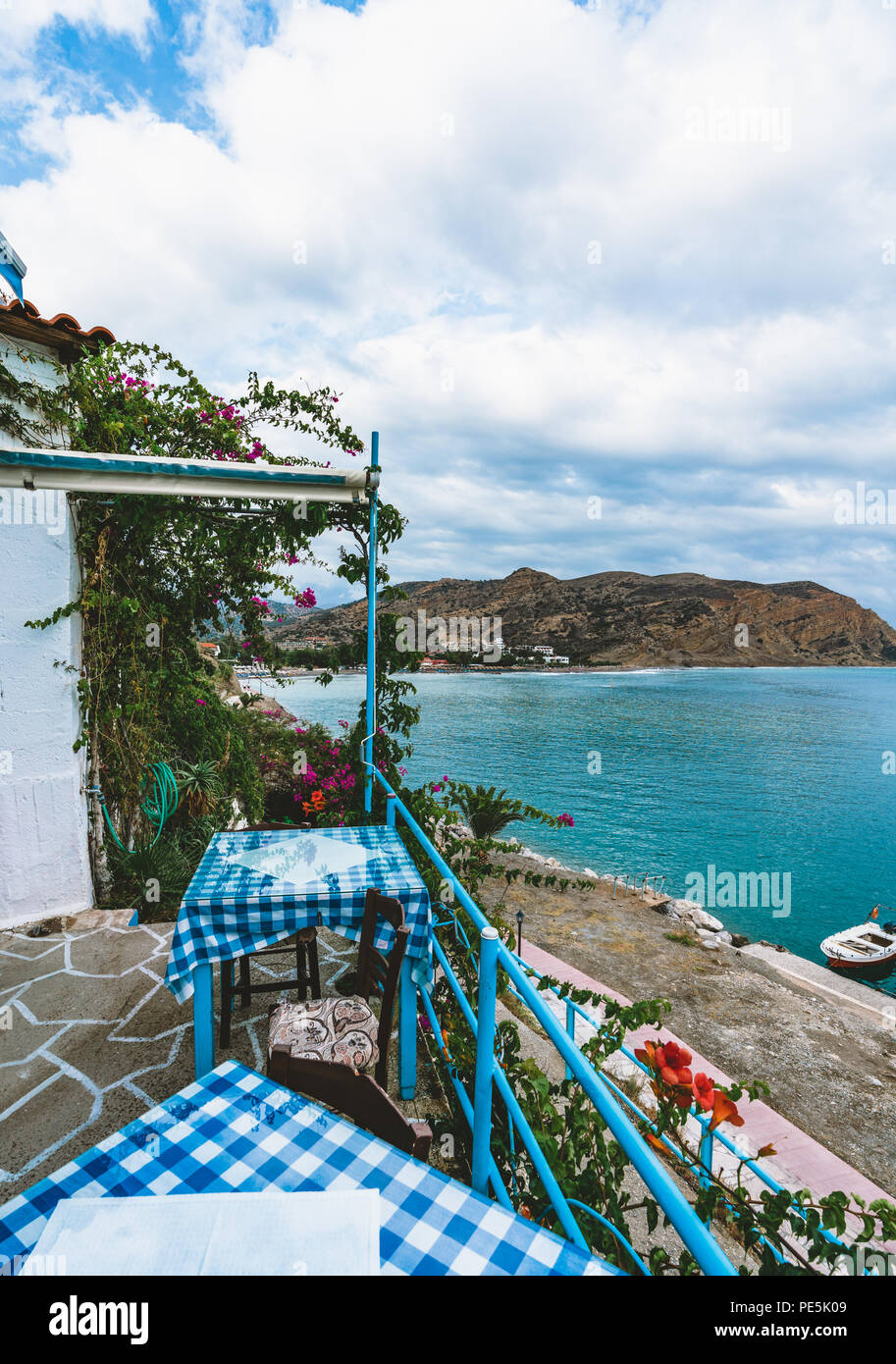 Greece Crete. Restaurant with served table in seafront of sea view ...