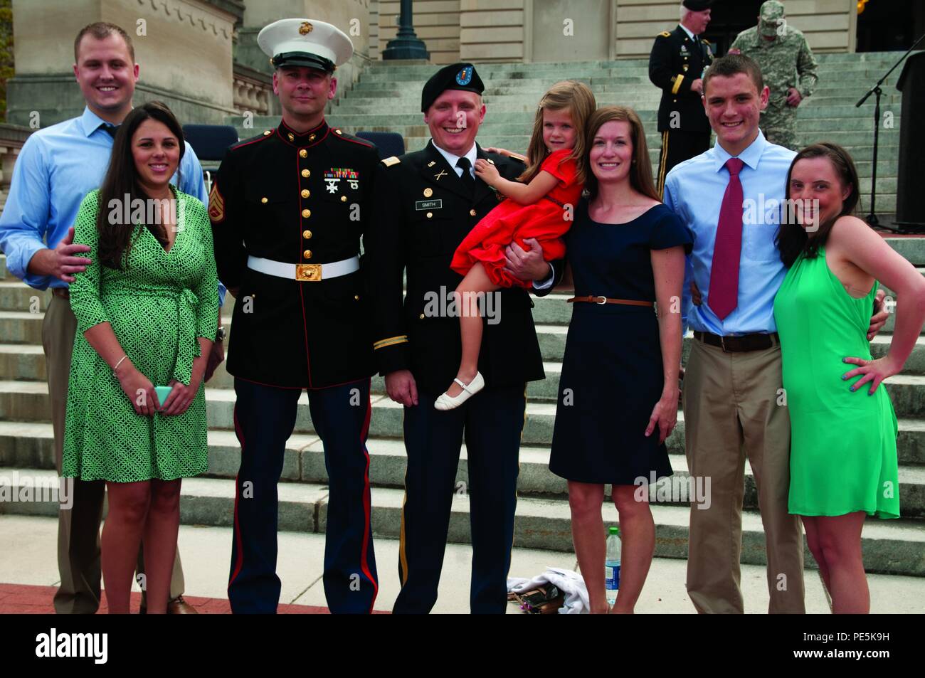 Newly promoted 2nd Lt. Benjamin R. Smith (center) poses with his family ...