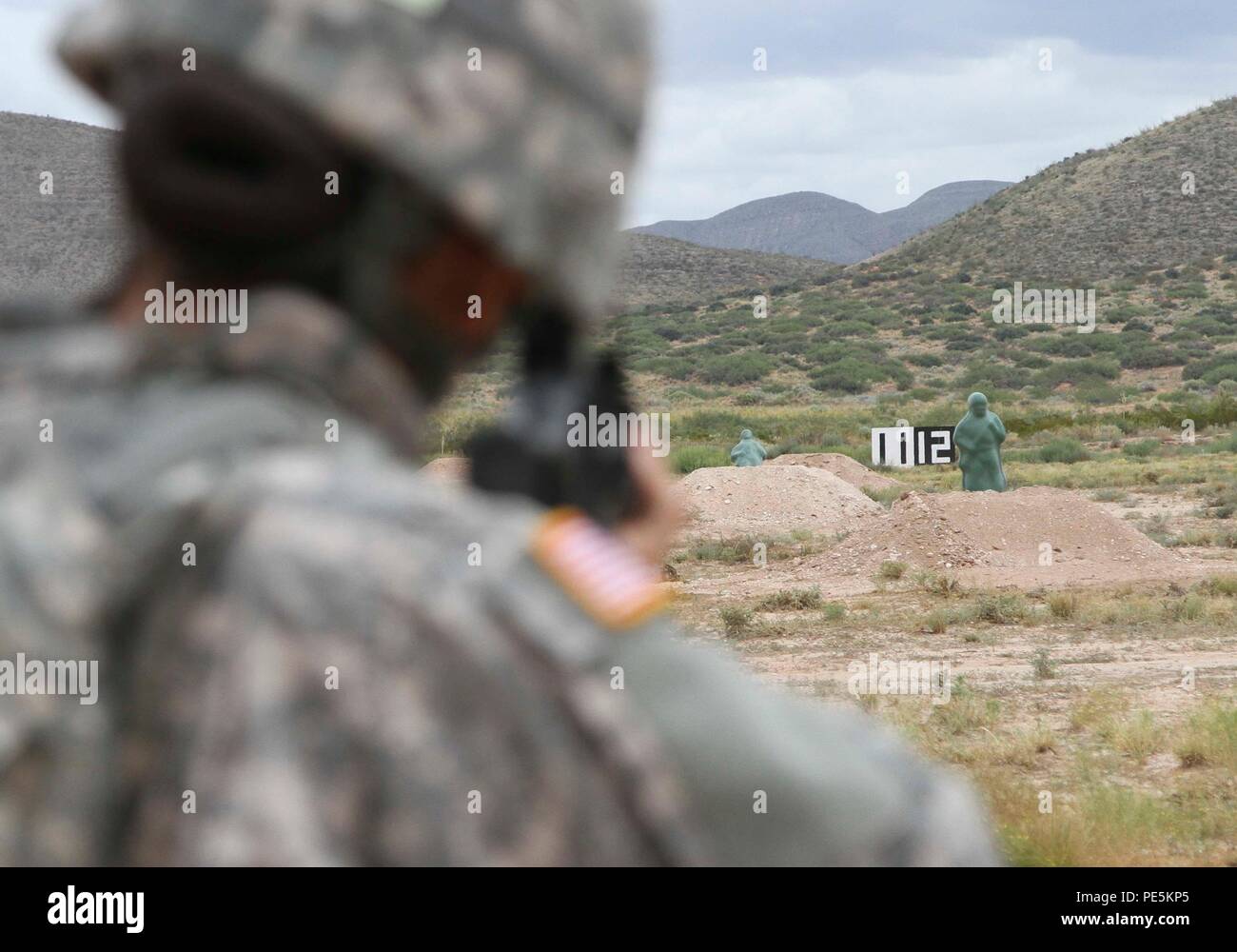 Spc. Anna Ramirez, military police, 89th Military Police Brigade, fires ...