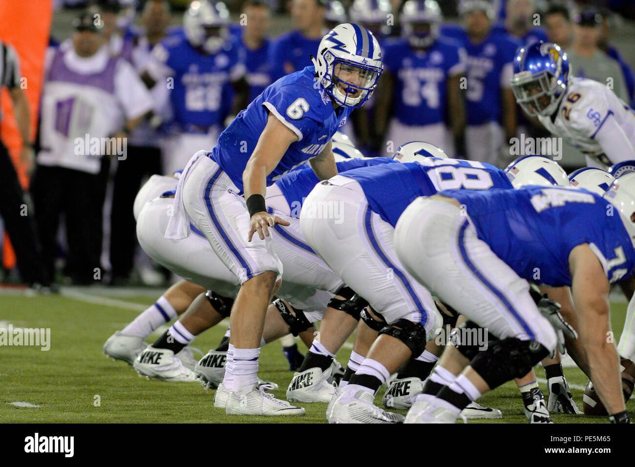 U.S. Air Force Academy quarterback Nate Romine, a junior, yells out a ...