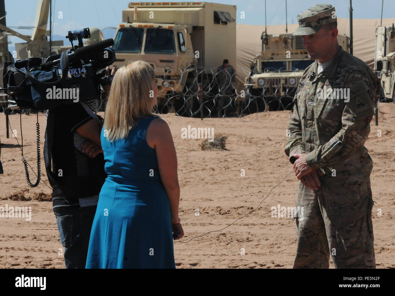 A reporter from KFOX14 speaks with Col. Charles Masaracchia, 2nd ...