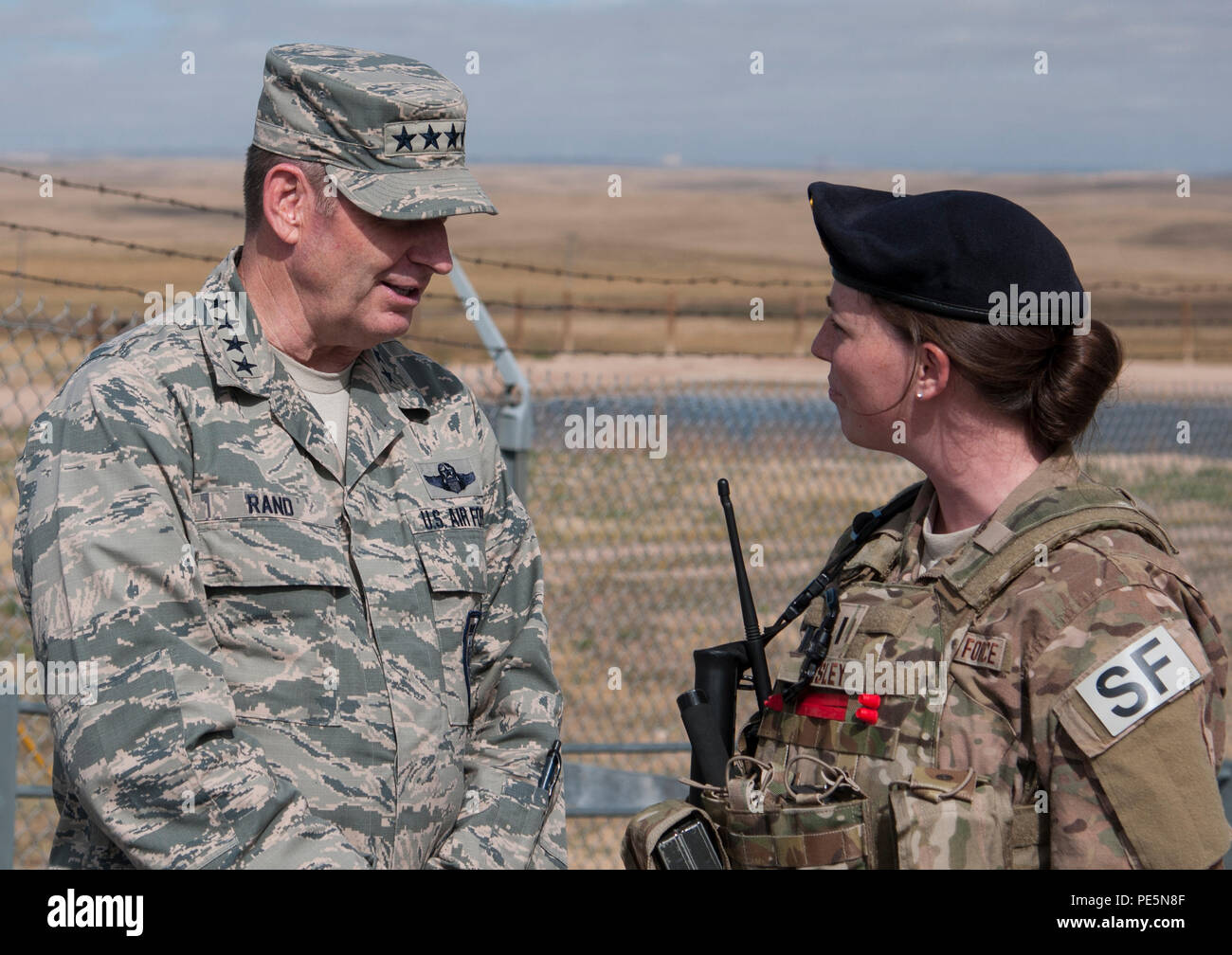 First Lt. Helen Ensley, a 90th Missile Security Forces Squadron flight commander, greets Gen ...