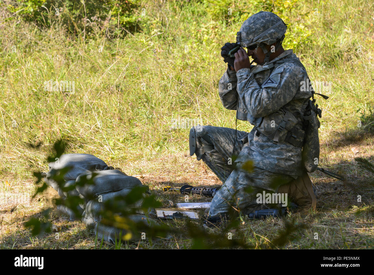 A U.S. Army Expert Infantryman Badge (EIB) candidate, stationed at the ...
