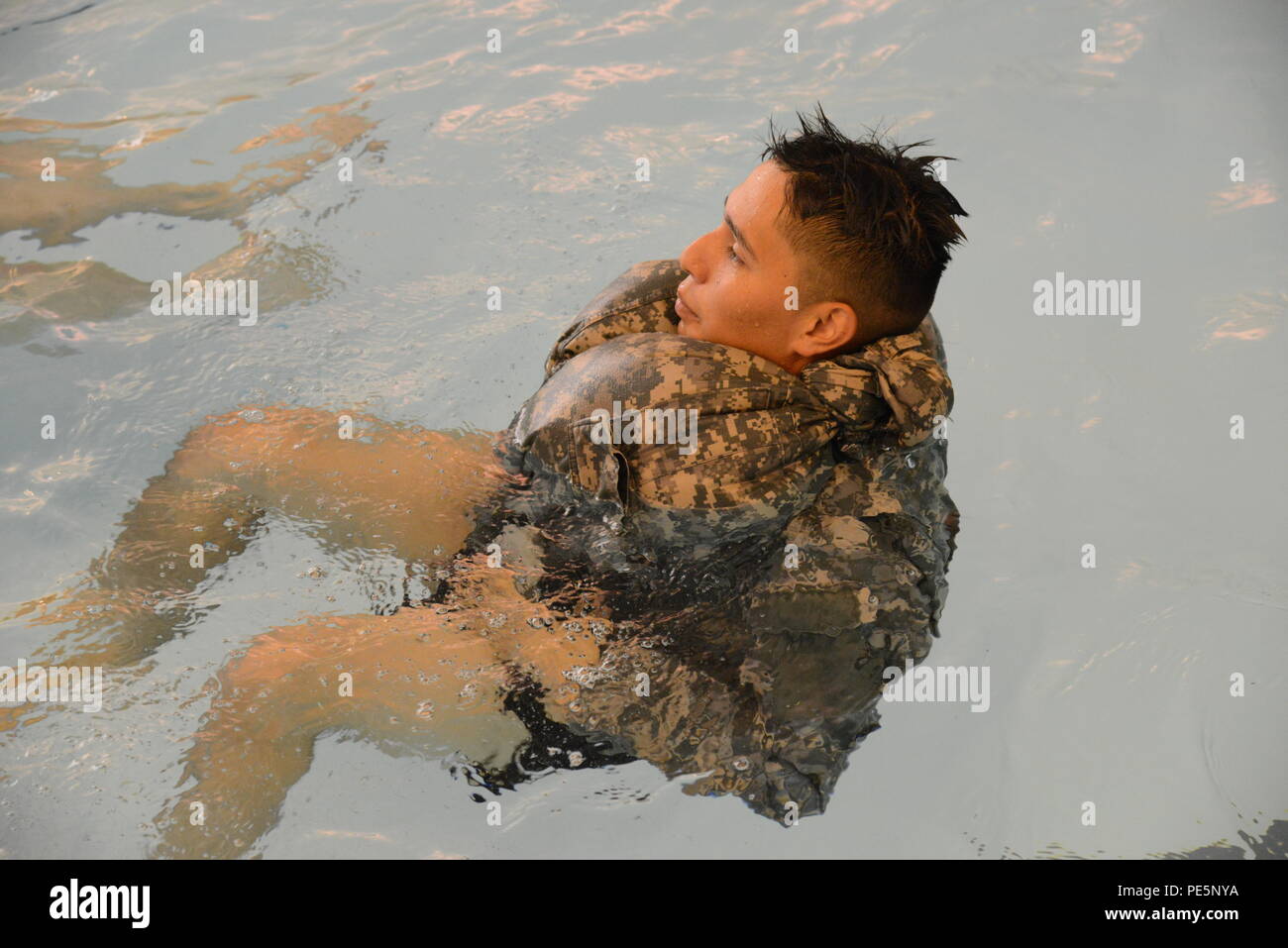U.S. Army Spc. Esai Valenzuela, assigned to assigned to 128th Signal ...