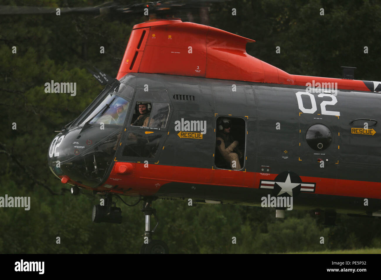 U.S. Marines with Marine Transport Squadron 1 (VMR-1) await orders to ...