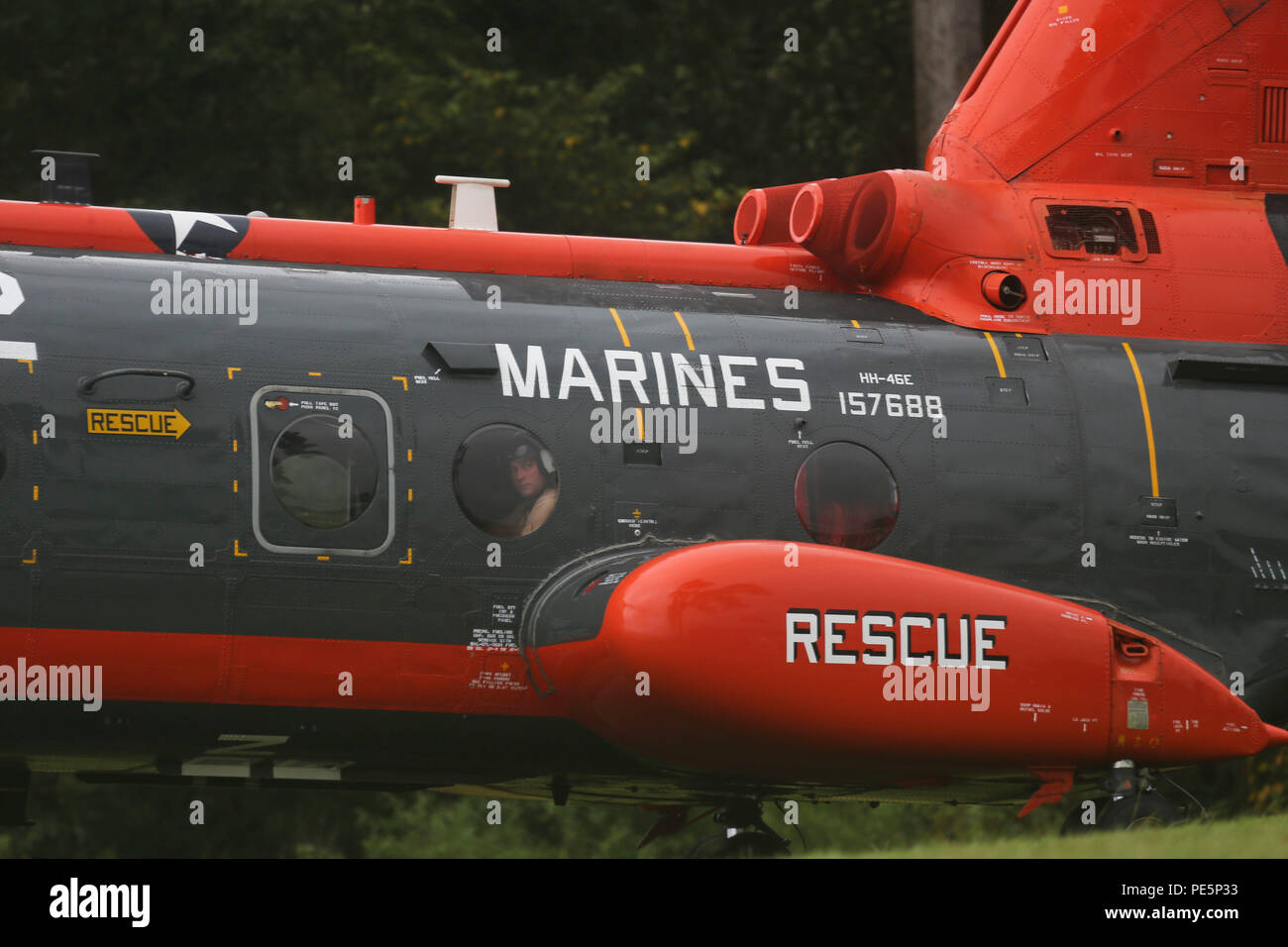U.S. Marines with Marine Transport Squadron 1 (VMR-1) await orders to ...