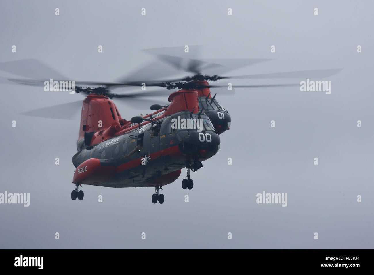 U.S. Marines with Marine Transport Squadron 1 (VMR-1) wave to ...