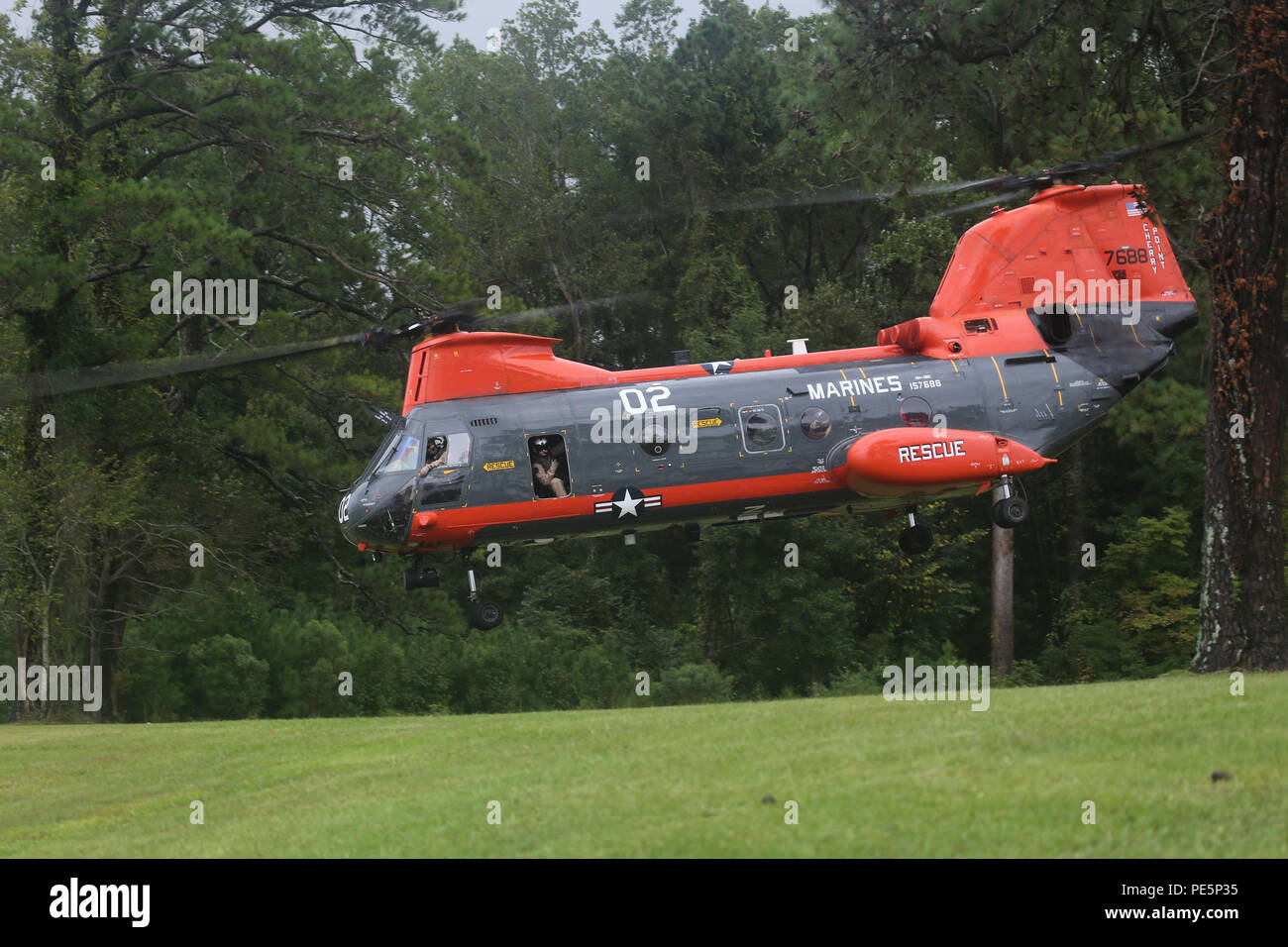 U.S. Marines with Marine Transport Squadron 1 (VMR-1) fly over Marine ...