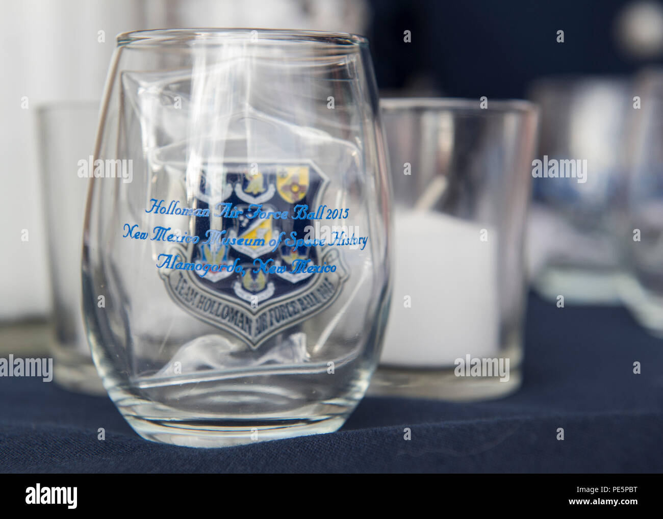 Tables at the 68th Air Force Ball are lined with souvenirs symbolizing ...