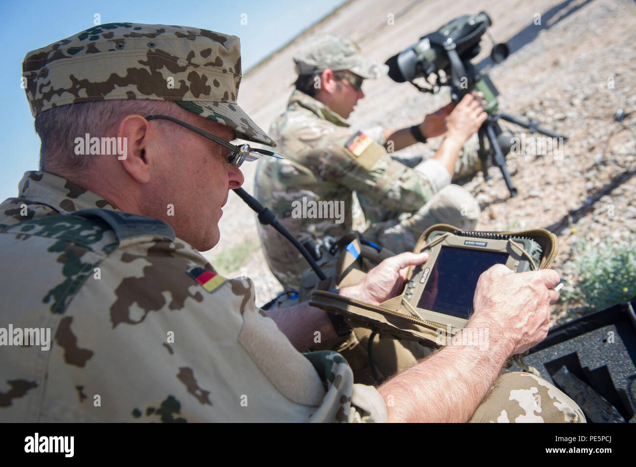 A German air force joint terminal air controller gathers intelligence ...