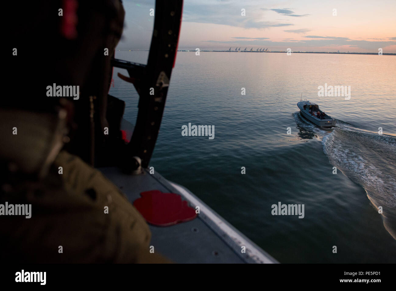 The boat performing rescue training with the MH-65 helicopter crew ...