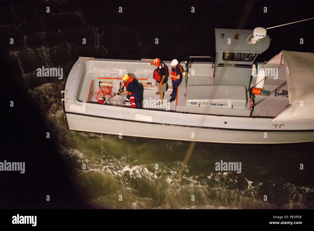The boat performing rescue training with the MH-65 helicopter crew ...
