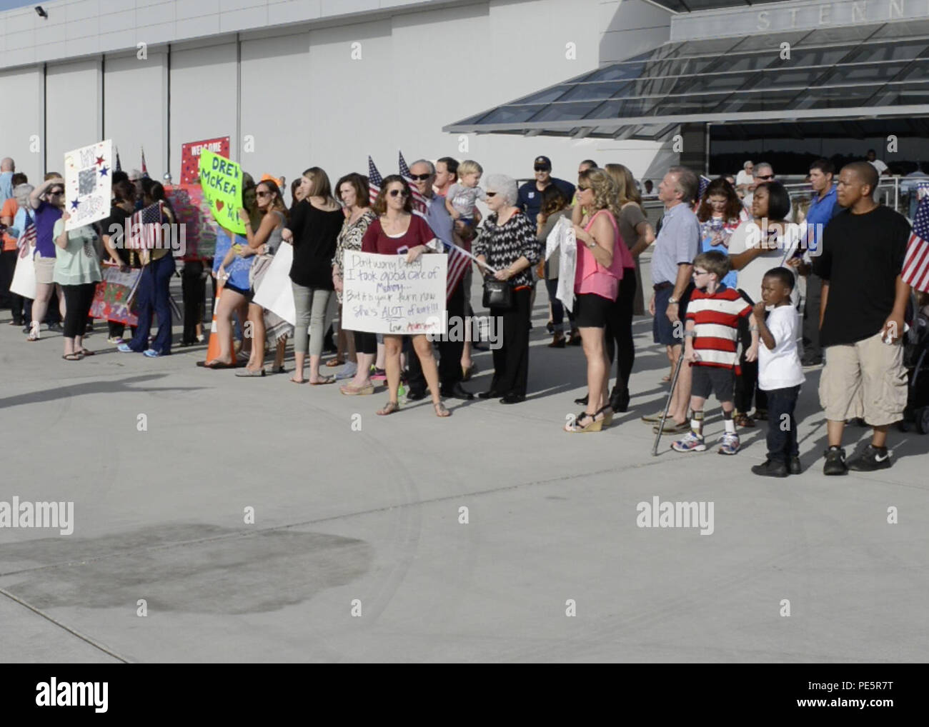 Family and friends of Coast Guard Port Security Unit 308 members await ...