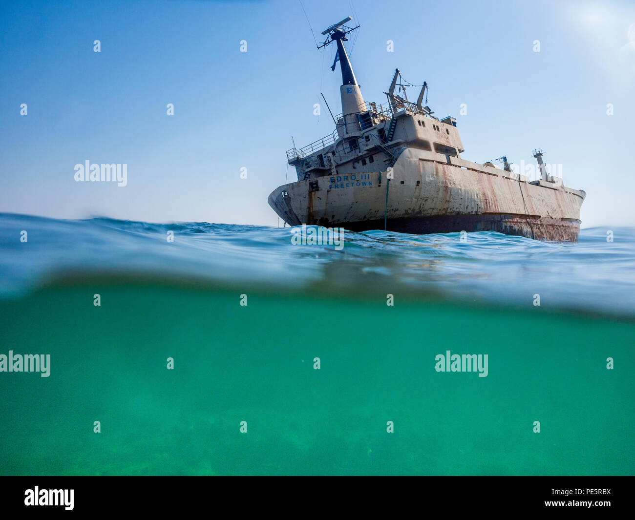 An abandoned shipwreck aground on rocks in Cyprus Stock Photo - Alamy