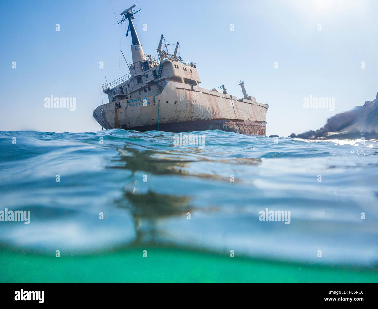 An abandoned shipwreck aground on rocks in Cyprus Stock Photo - Alamy