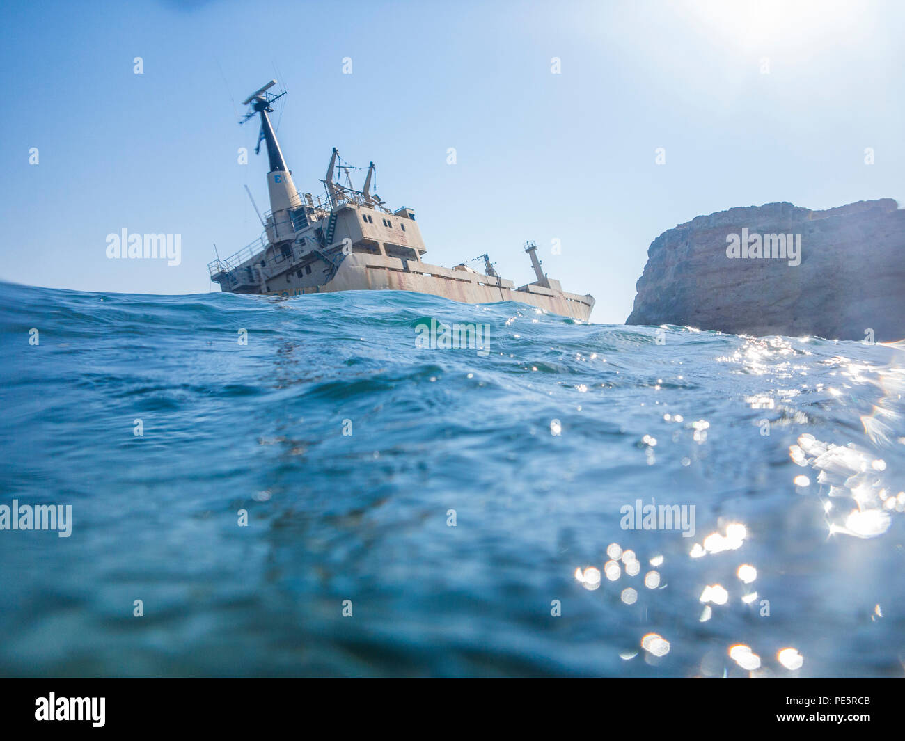 An abandoned shipwreck aground on rocks in Cyprus Stock Photo - Alamy