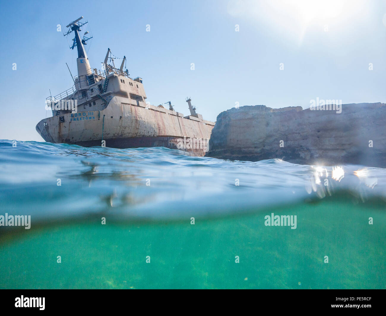 An abandoned shipwreck aground on rocks in Cyprus Stock Photo - Alamy