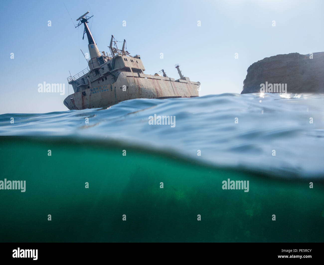 An abandoned shipwreck aground on rocks in Cyprus Stock Photo - Alamy