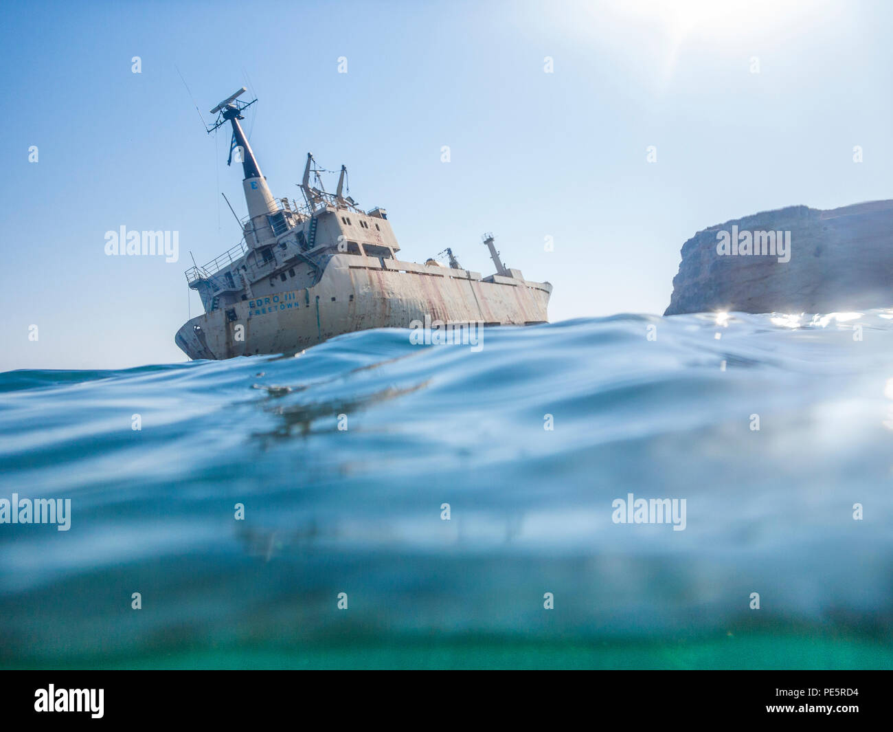 An abandoned shipwreck aground on rocks in Cyprus Stock Photo - Alamy