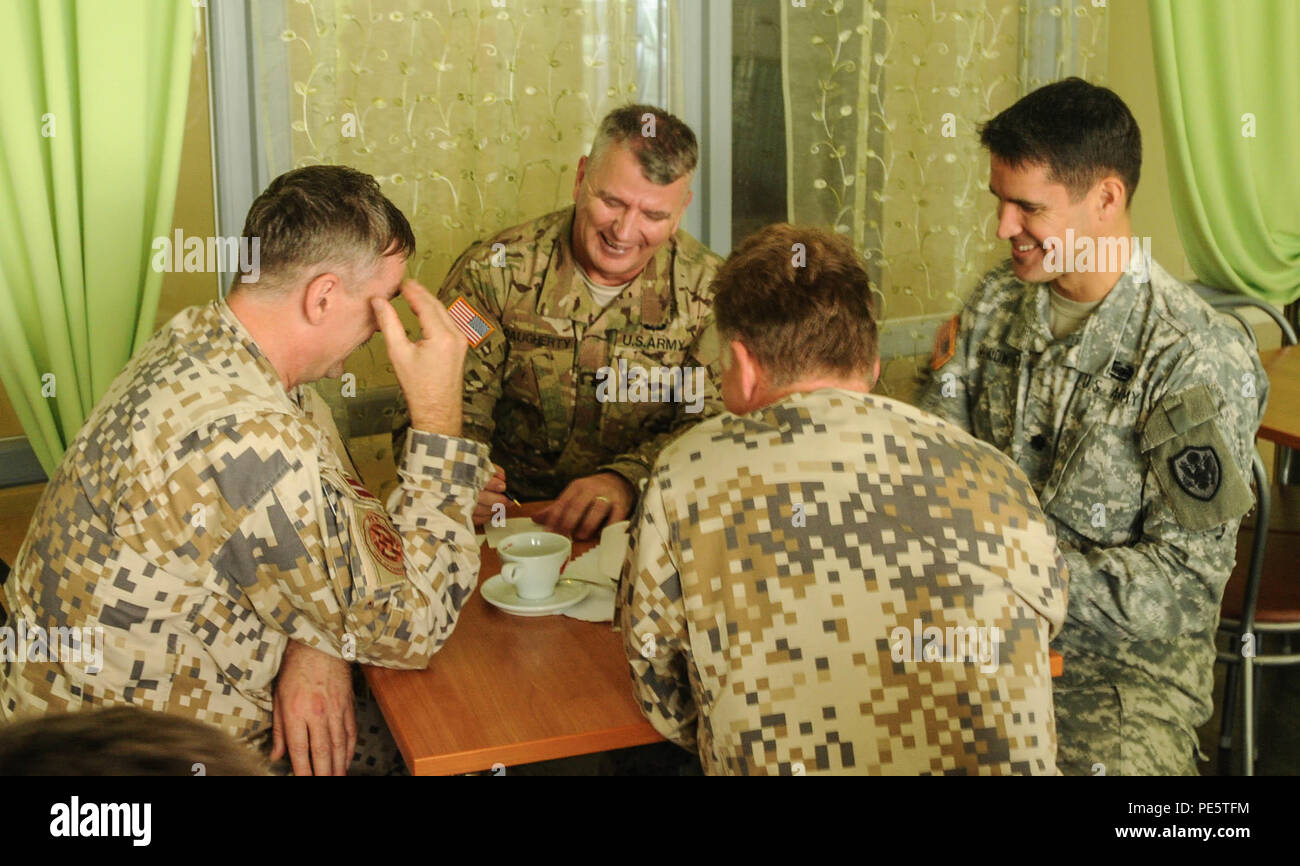 Clockwise from left, Latvian Brigadier General Ainars Ozolins, deputy ...