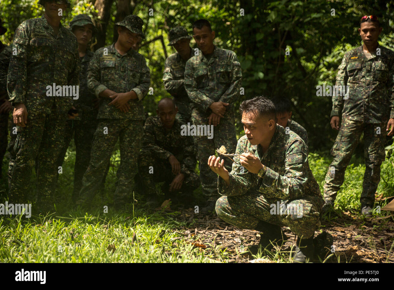 Philippine Marine Corps Staff Sgt. Bimbo R. Busico explains how to make ...